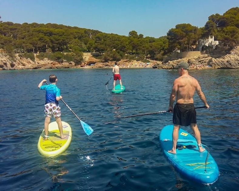 Guided day or sunset SUP tour in Mallorca with beginner option | musement